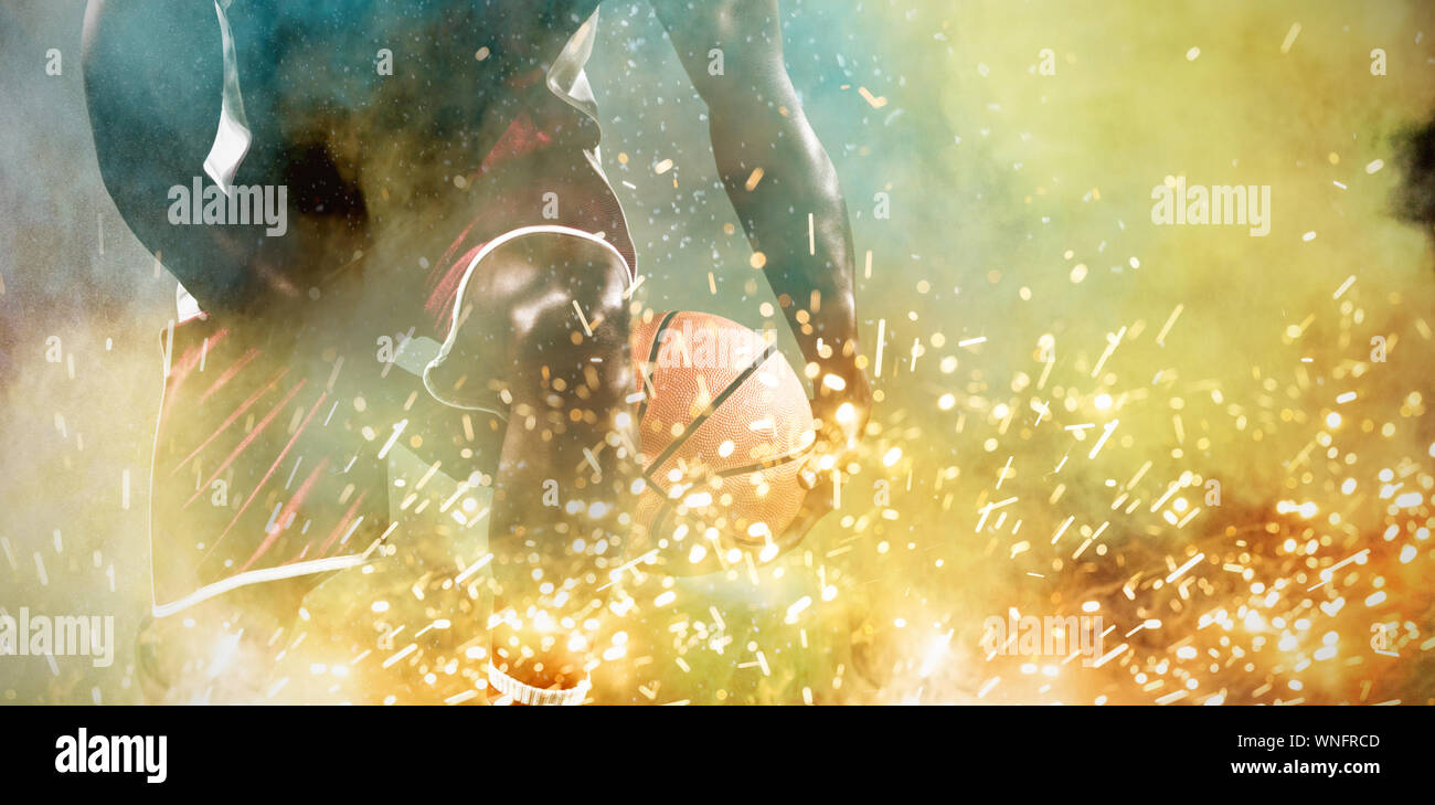 Composite image of basketball player Stock Photo - Alamy