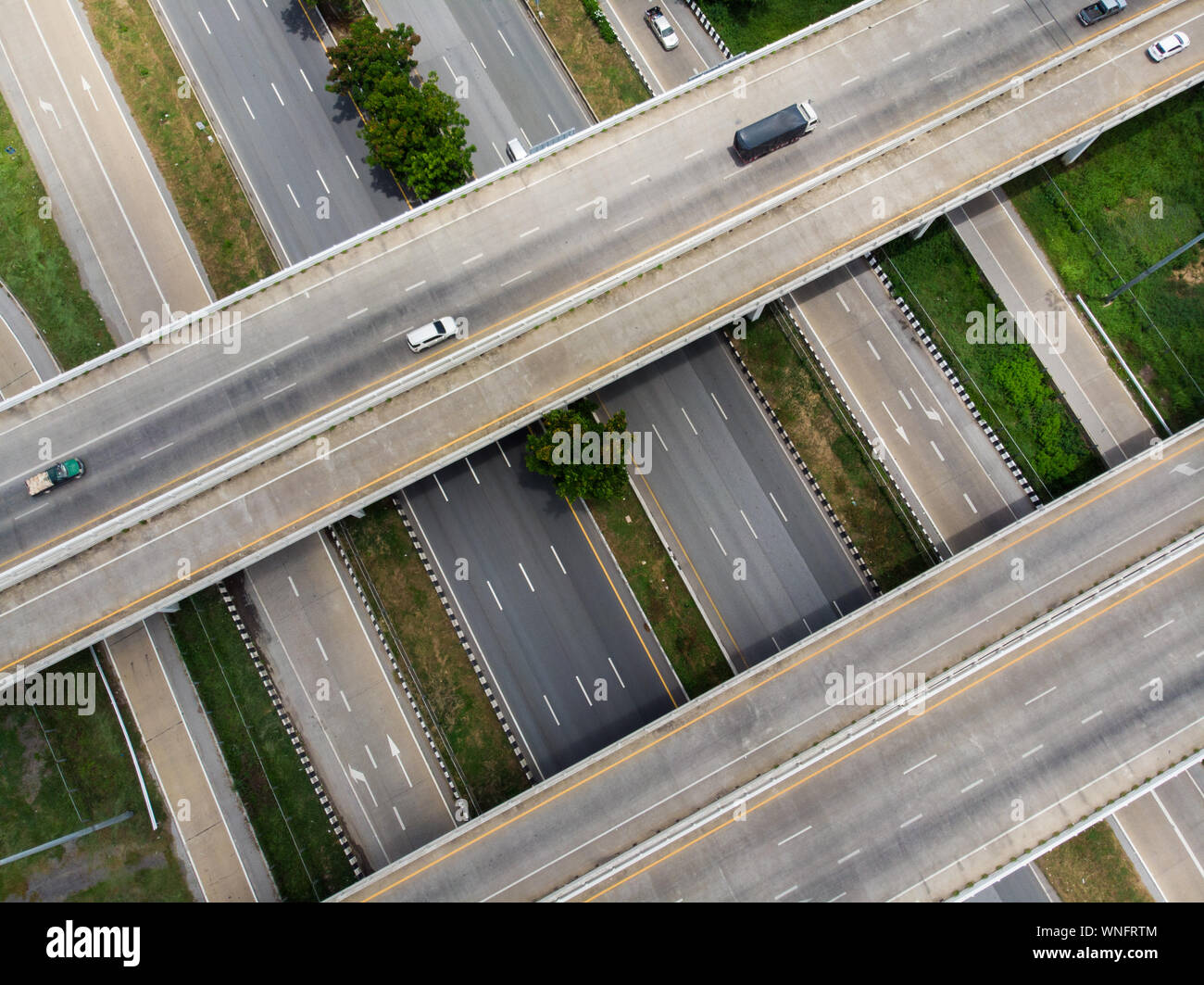 City transport cross junction asphalt road with car and truck movement ...