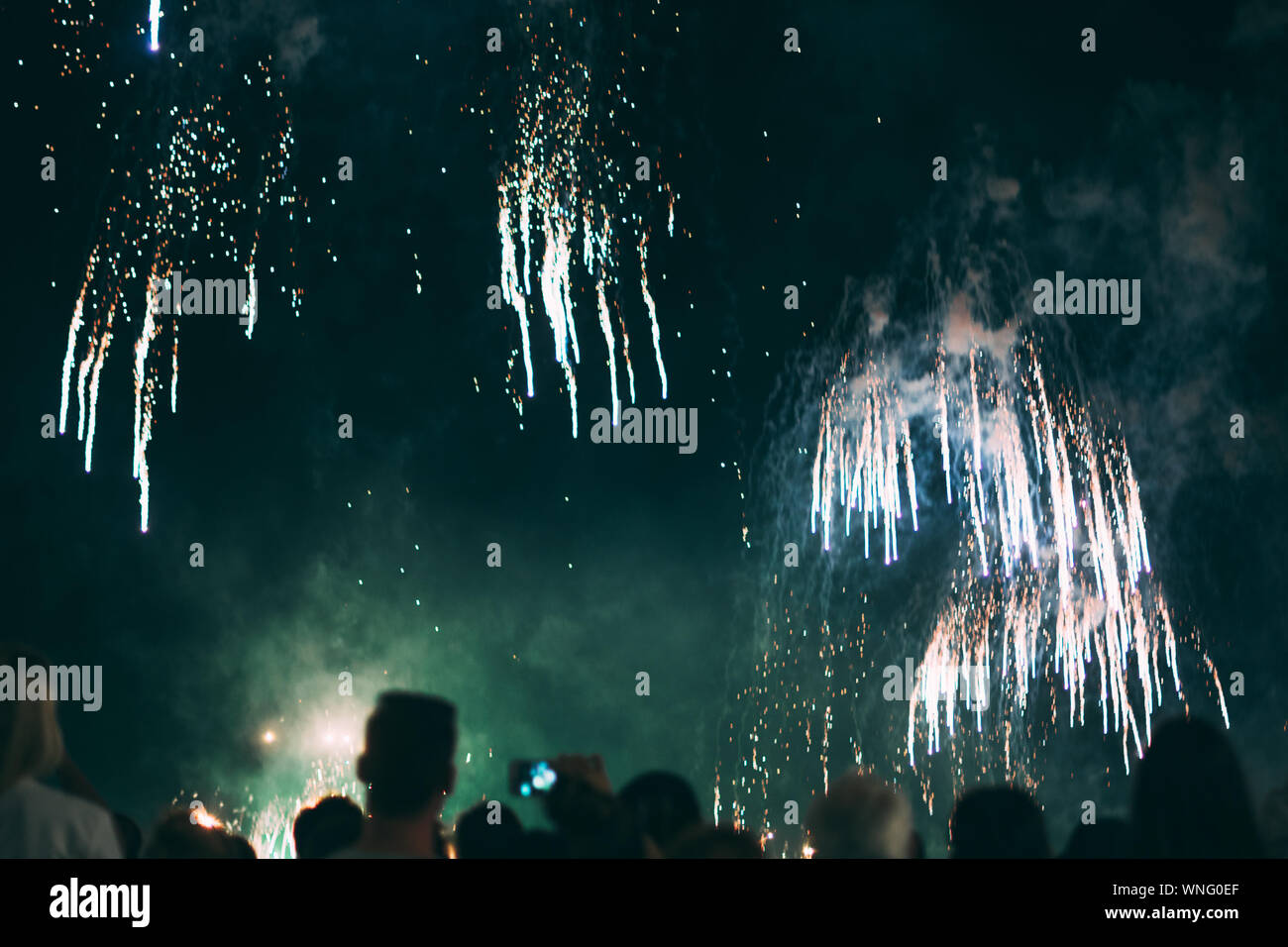 People watching firework display hi-res stock photography and images ...