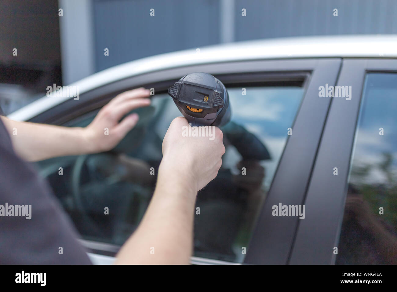 Heat gun window tinting hi-res stock photography and images - Alamy