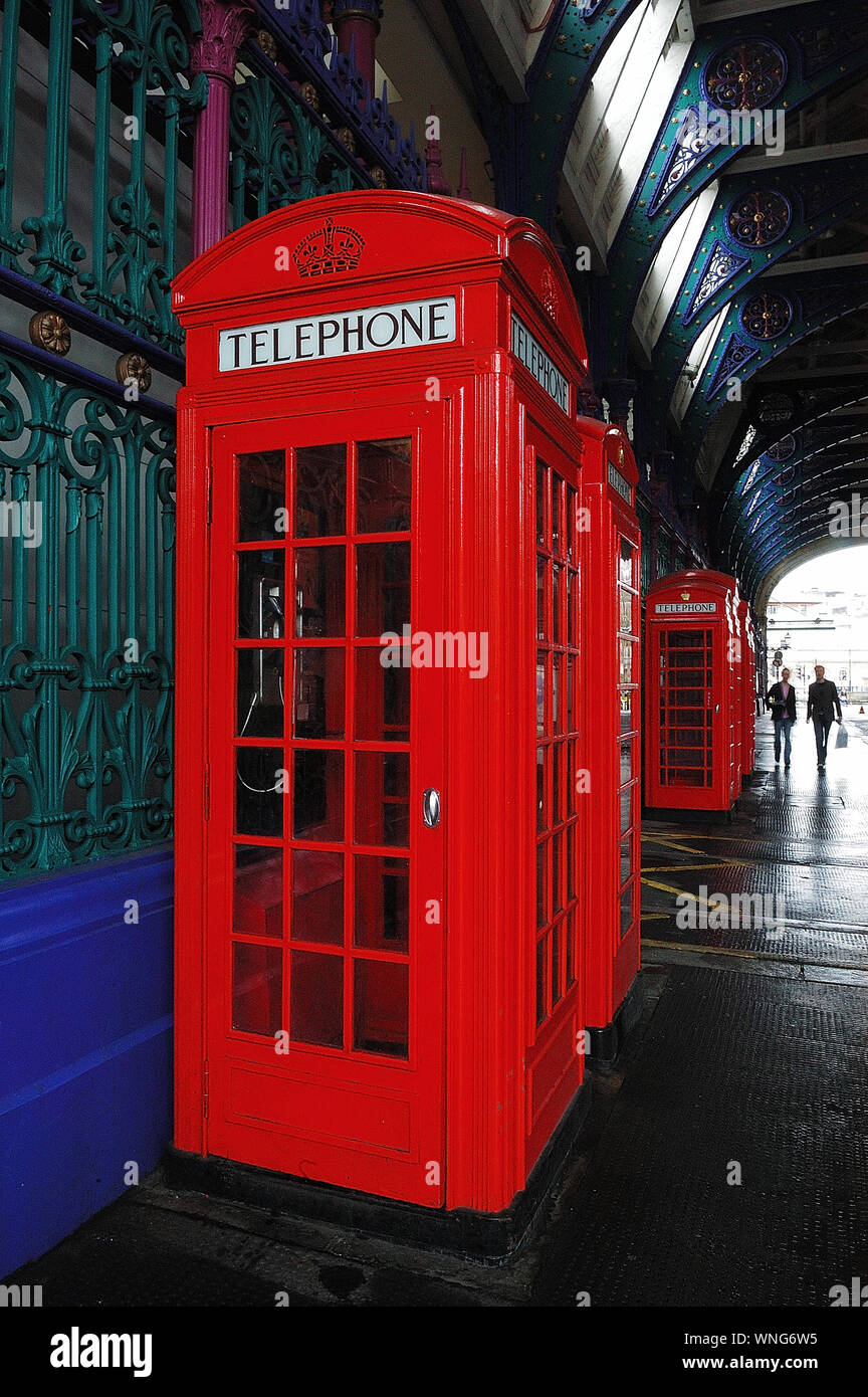 Typical red phone booths in the city of london hi-res stock photography ...