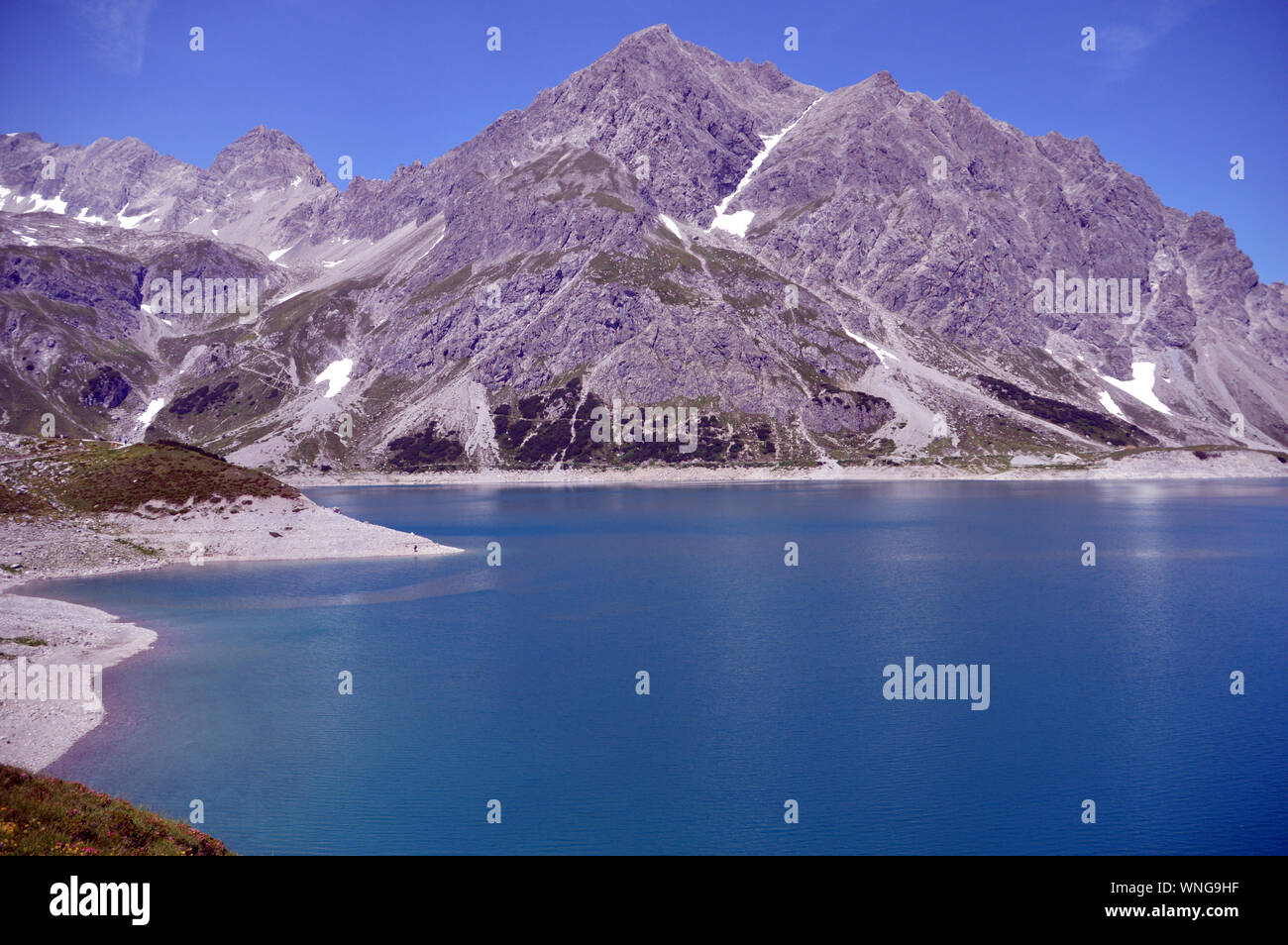 Beautiful mountain lake between glaciers Stock Photo - Alamy