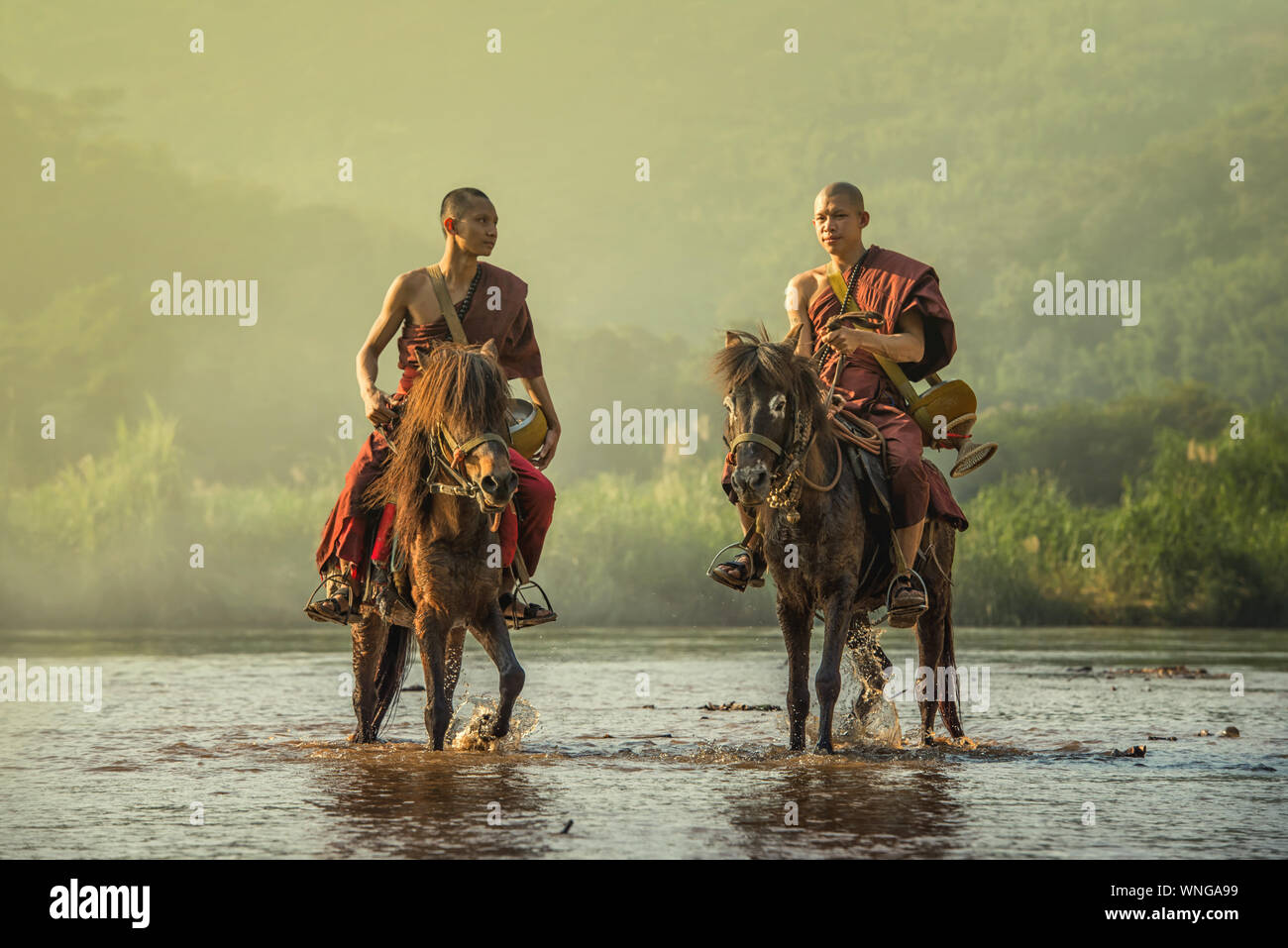 Two monks water hi-res stock photography and images - Alamy
