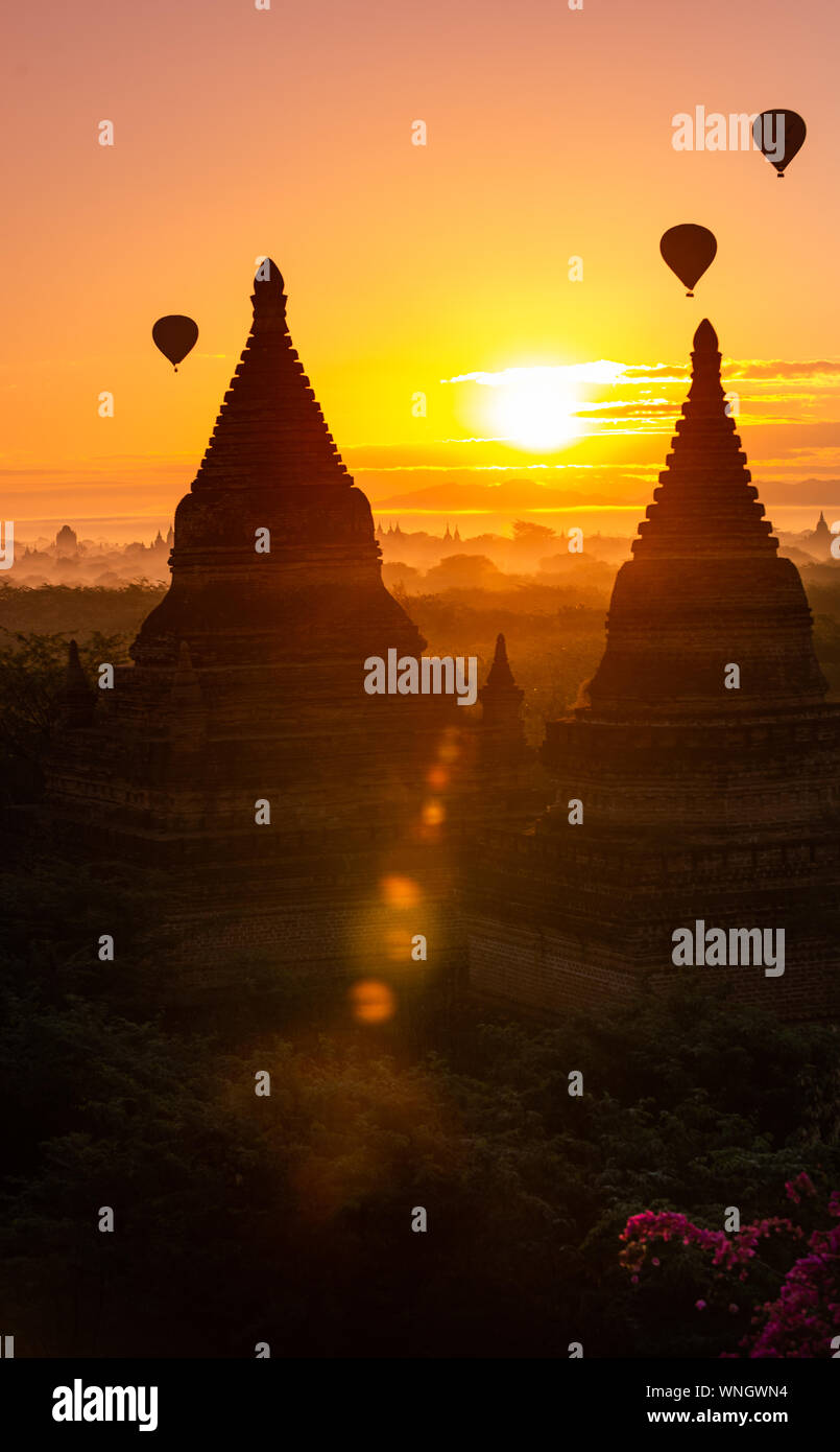 Hot air balloons floating at sunrise over Bagan Myanmar, Pagodas and ...