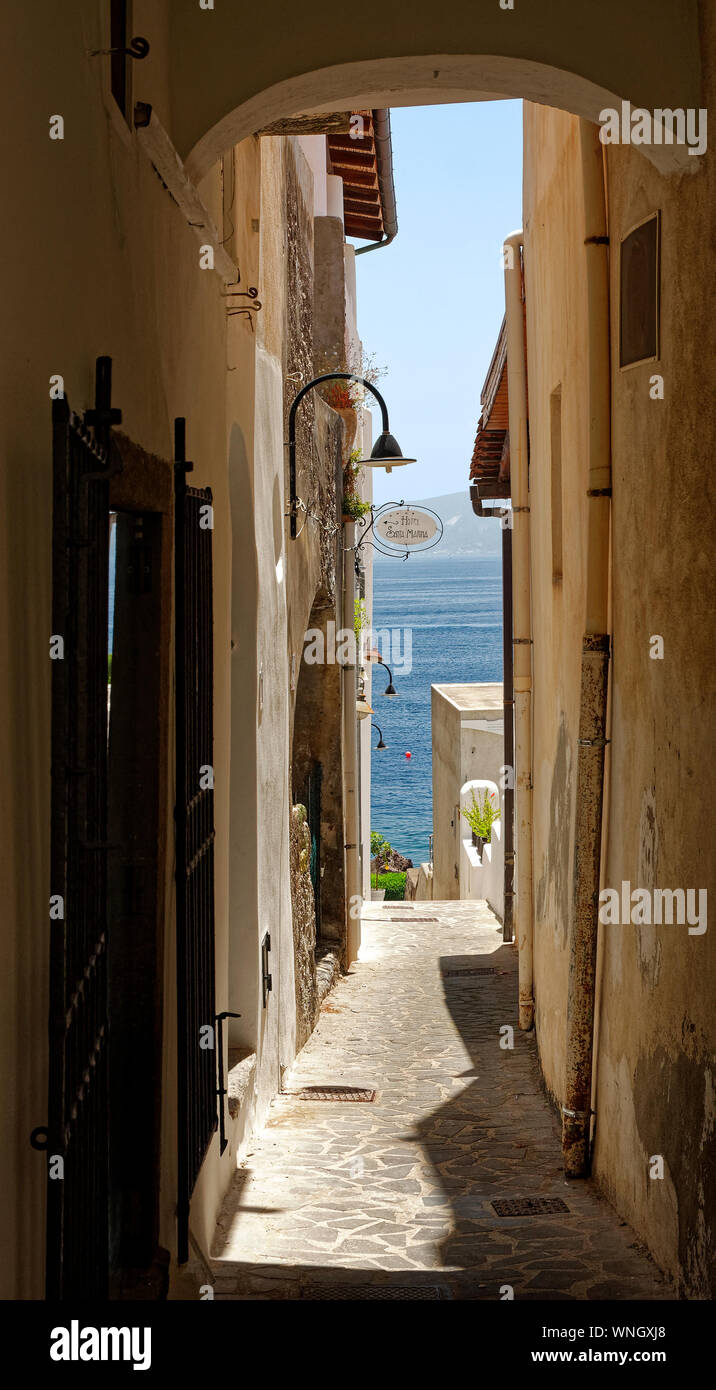 narrow passageway, stone, old buildings, lights, sea view, water ...