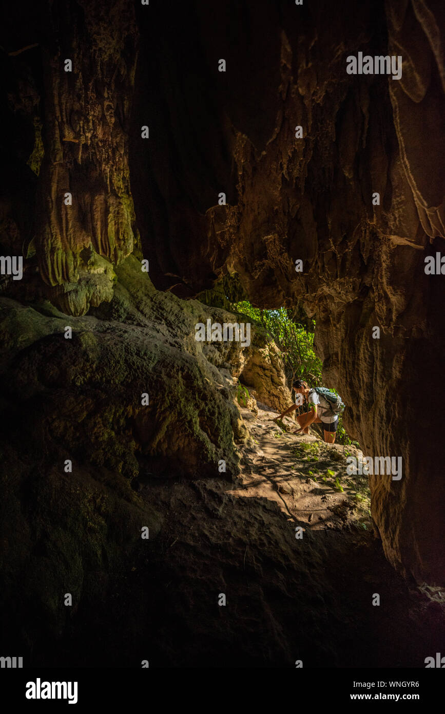 Tourist exploring Cave near the Tararak Waterfall Trail Mae Sot ...