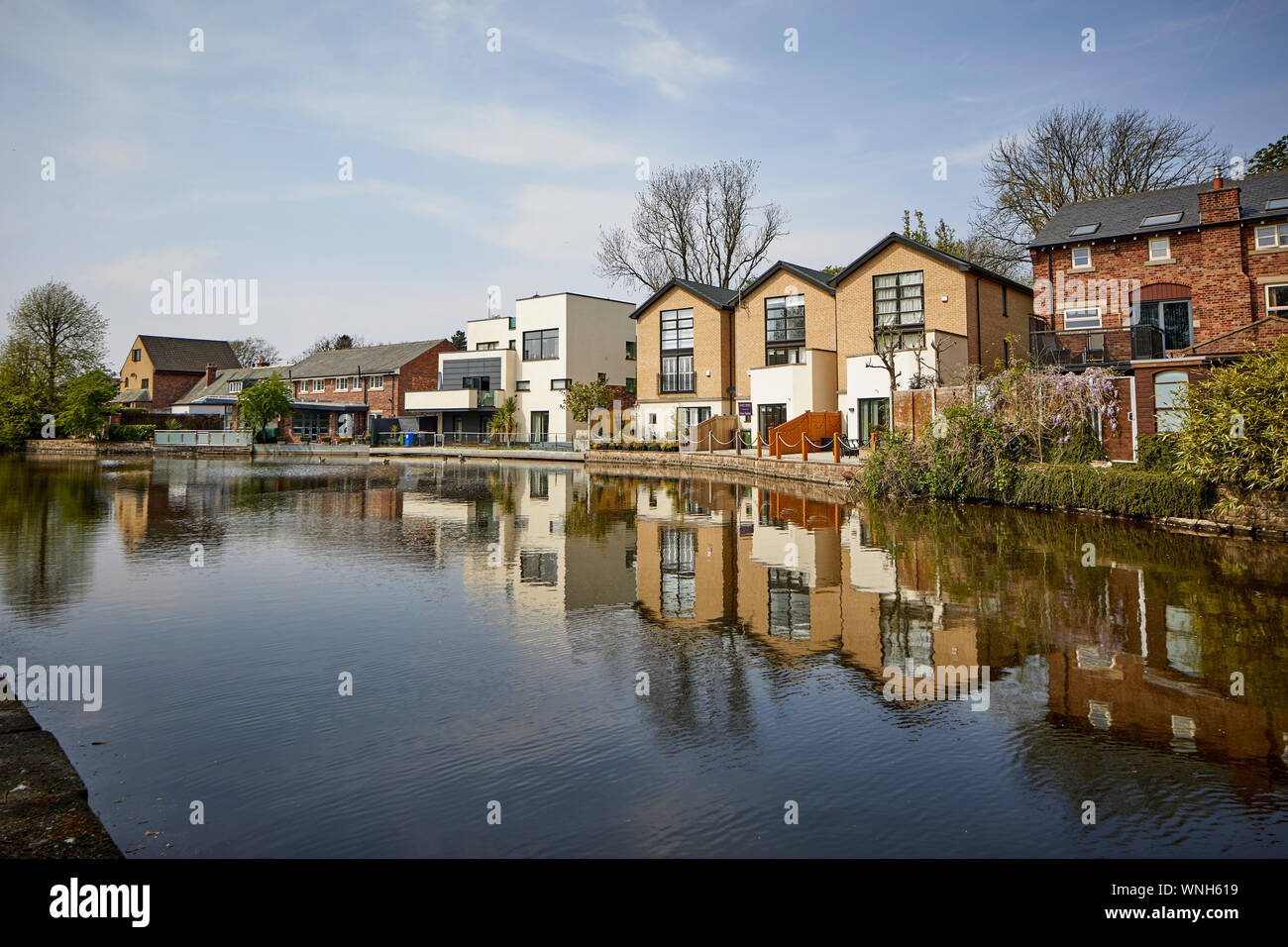 Tameside landmarks, Ashton Canal in Audenshawe modern houses on the ...