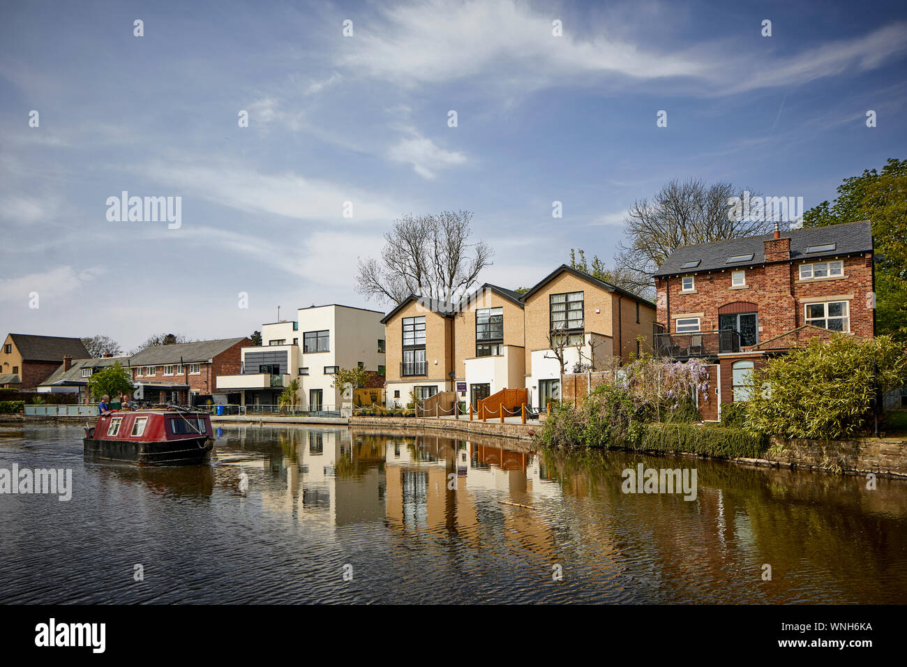 Tameside landmarks, Ashton Canal in Audenshawe modern houses on the ...