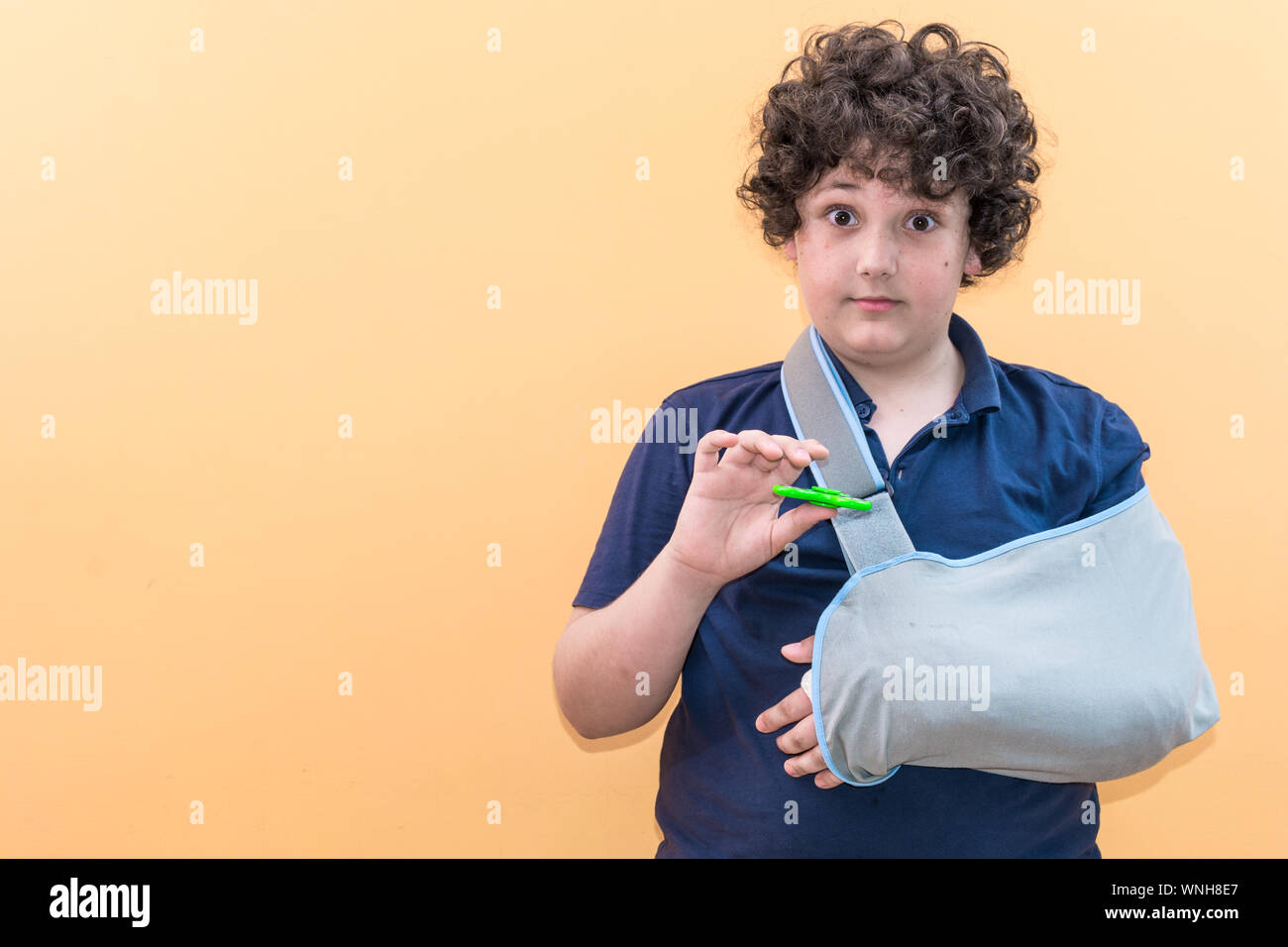 Boy injured arm hi-res stock photography and images - Alamy