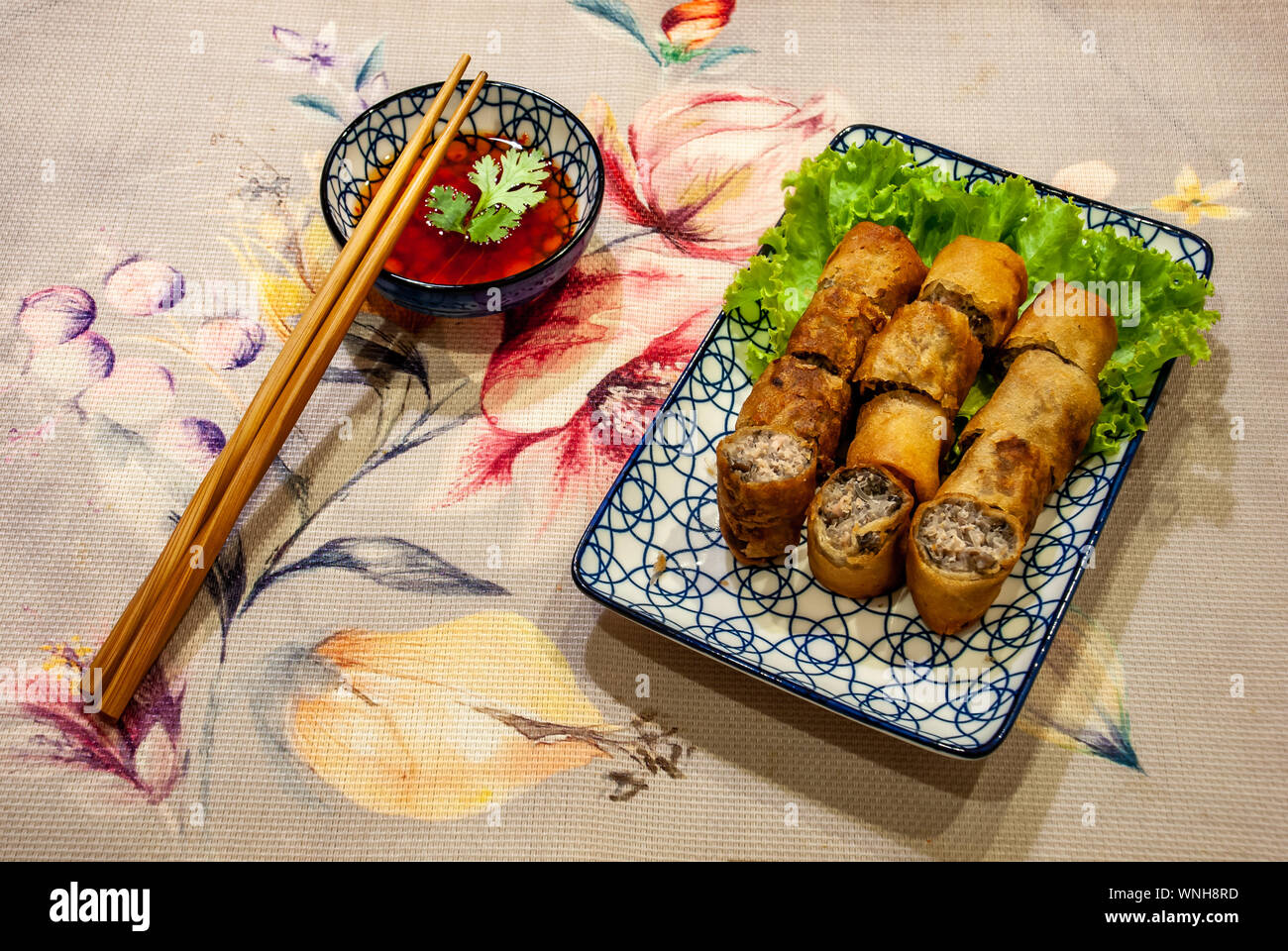 Fried traditional spring rolls food with sweet sauce in a japanese ...