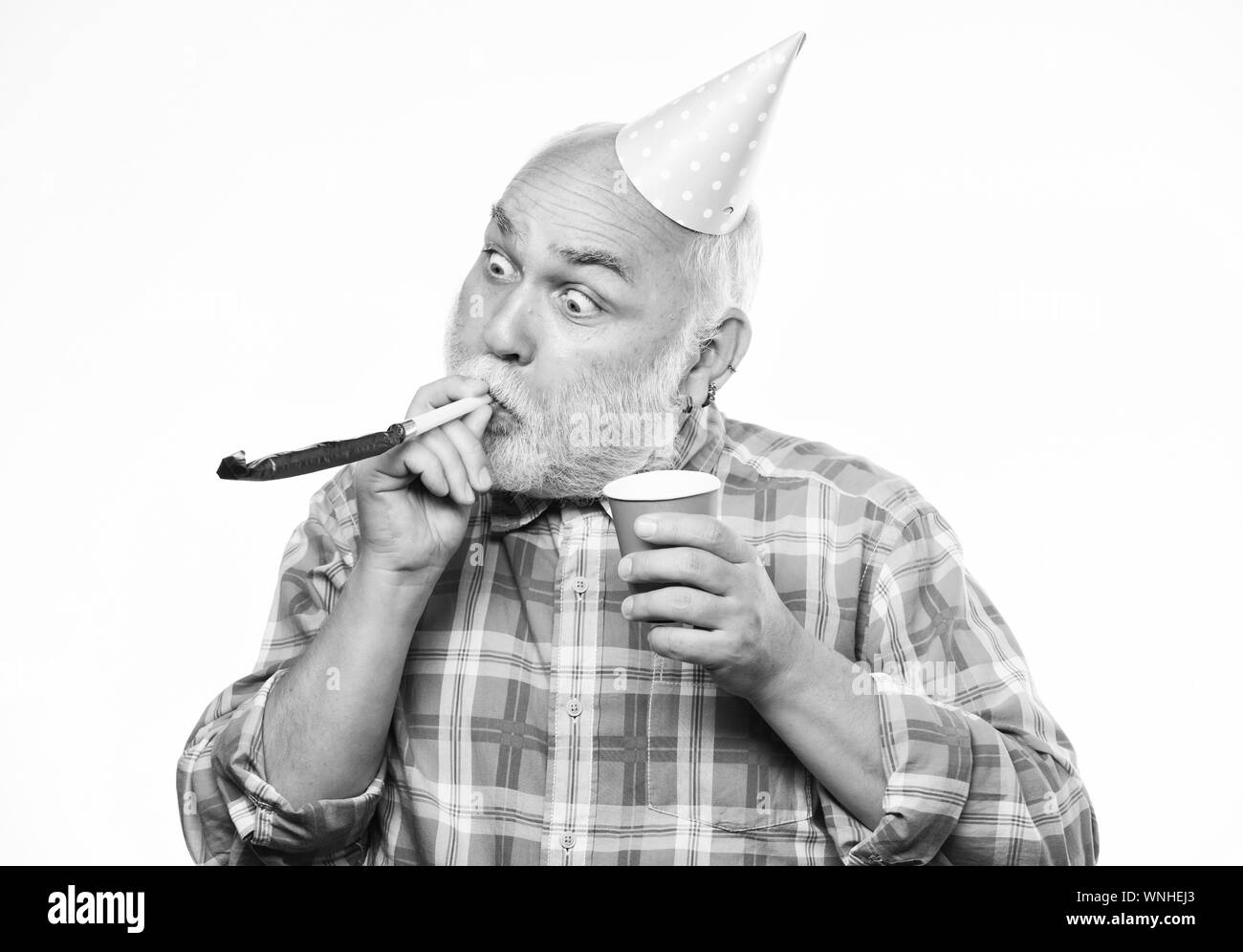 mature bearded man in pionted hat. anniversary holiday celebration. man ...