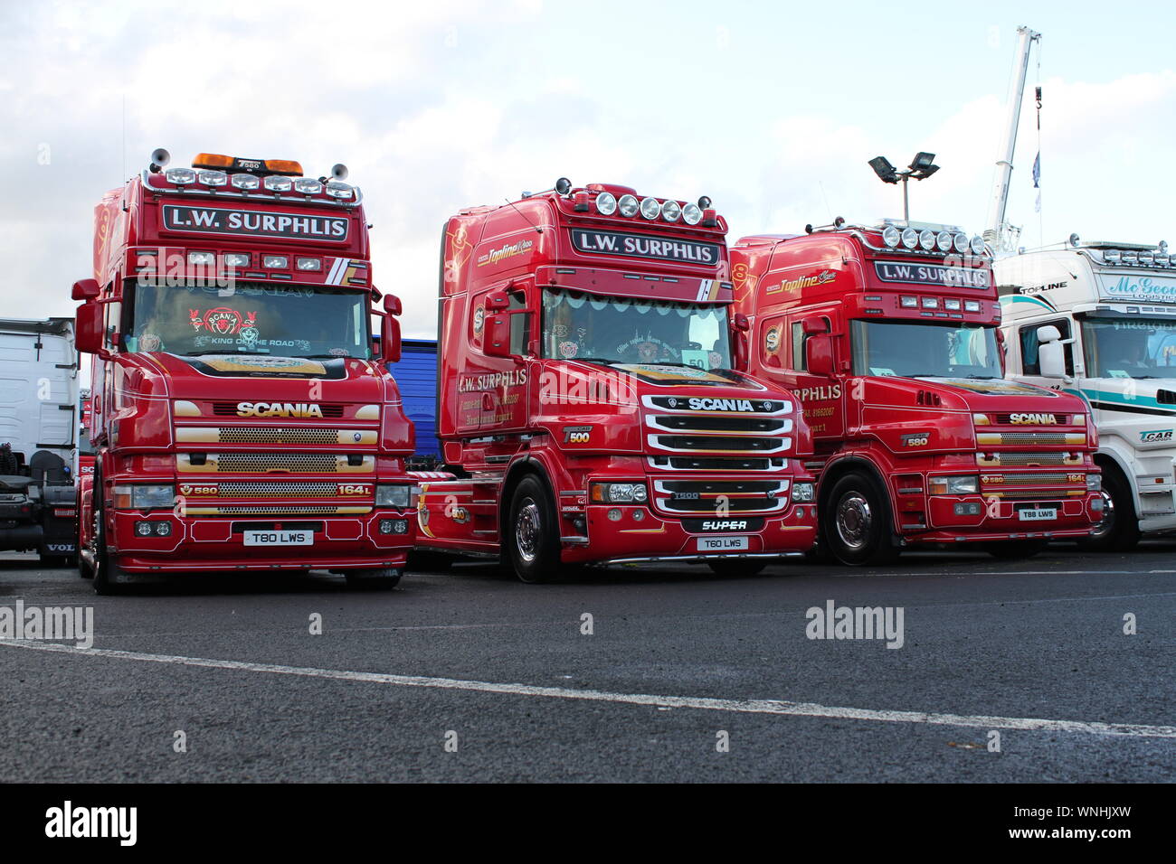 Three of L.W. Surphlis' red lorries seen at Causeway Coast Truckfest: 2 ...