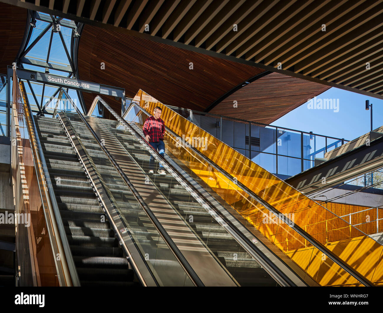 Escalators from station entrance to platforms. North West Metro ...