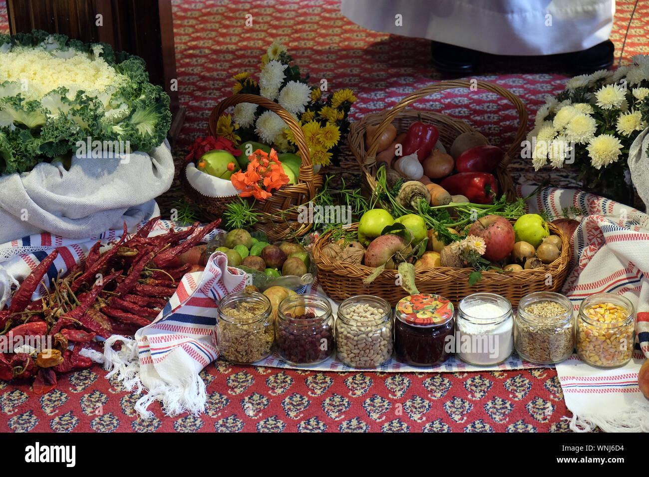 Offerings placed in front of the altar before Mass on Thanksgiving day ...