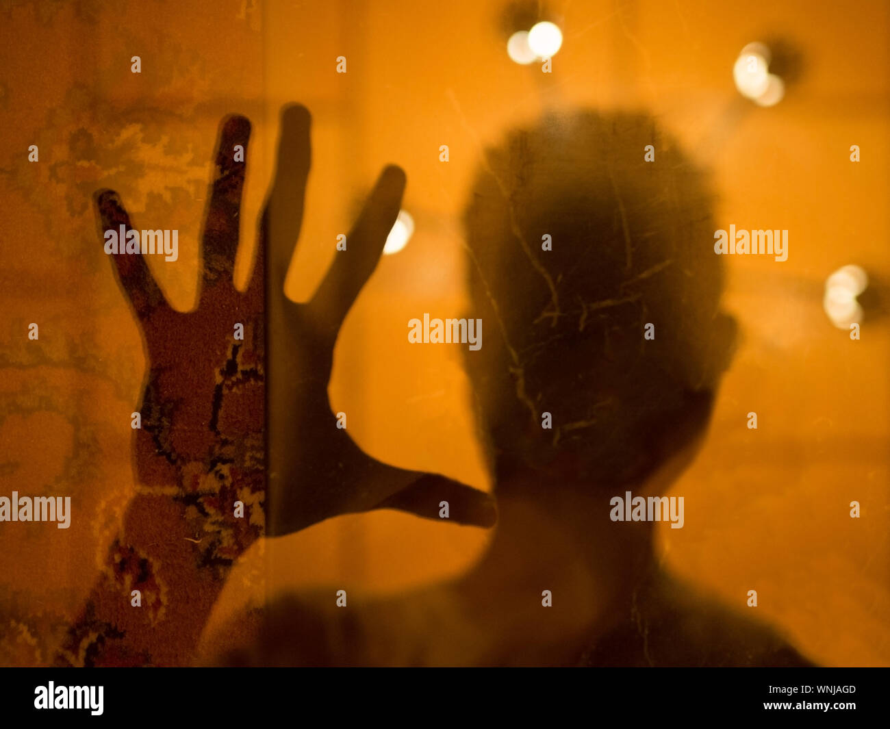 Man orange glass hi-res stock photography and images - Alamy