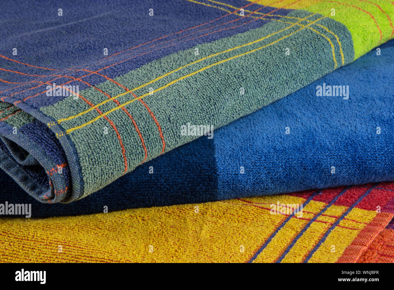 Folded beach towel swimming pool hi-res stock photography and images ...