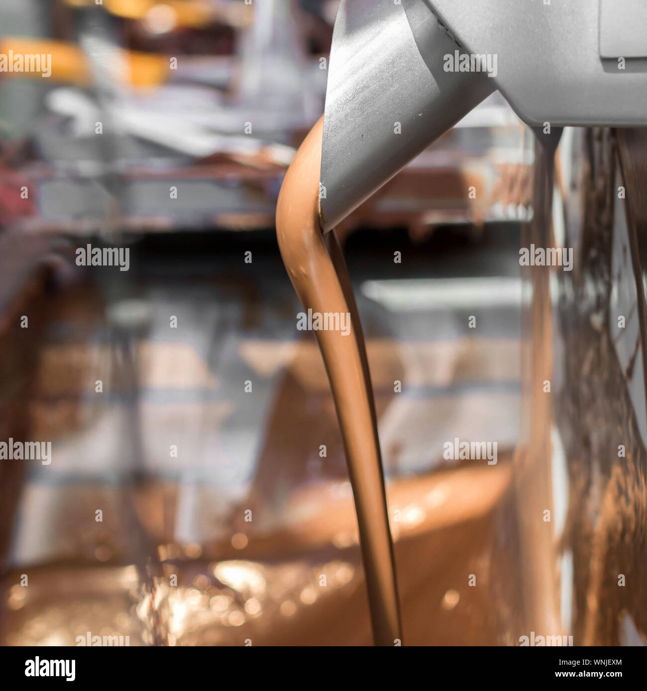 Liquid chocolate factory hi-res stock photography and images - Alamy