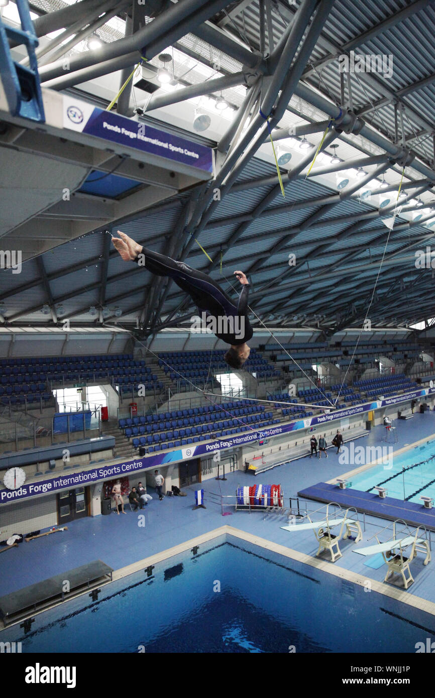 Man diving into pool hi-res stock photography and images - Alamy