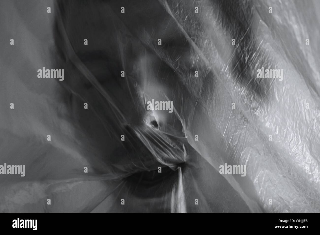 Face Covered With Plastic High Resolution Stock Photography and Images ...