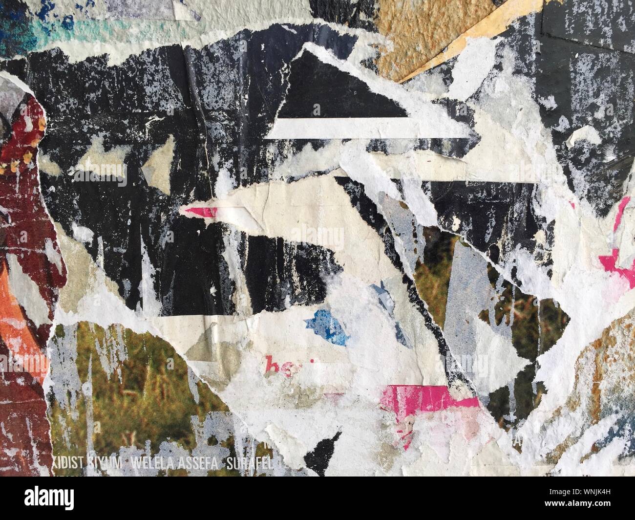 Torn posters on wall hi-res stock photography and images - Alamy