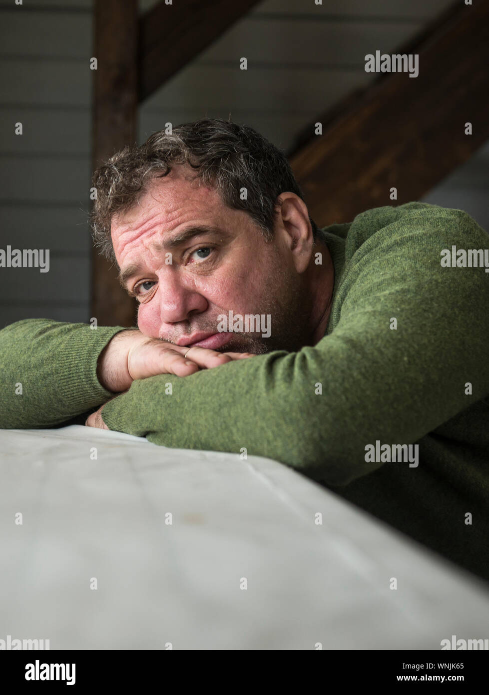 Leaning on his elbows hi-res stock photography and images - Alamy