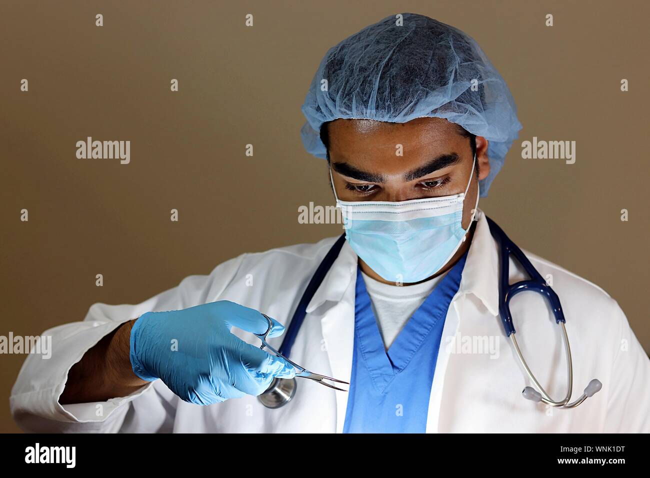 Doctor scissors hi-res stock photography and images - Alamy