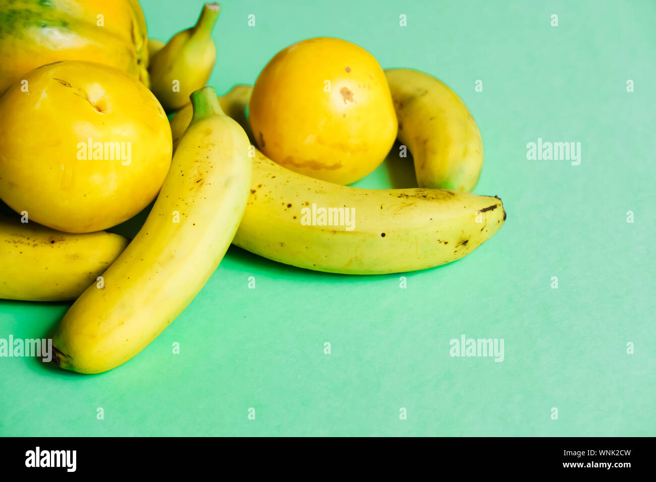 Yellow fruits background Stock Photo - Alamy