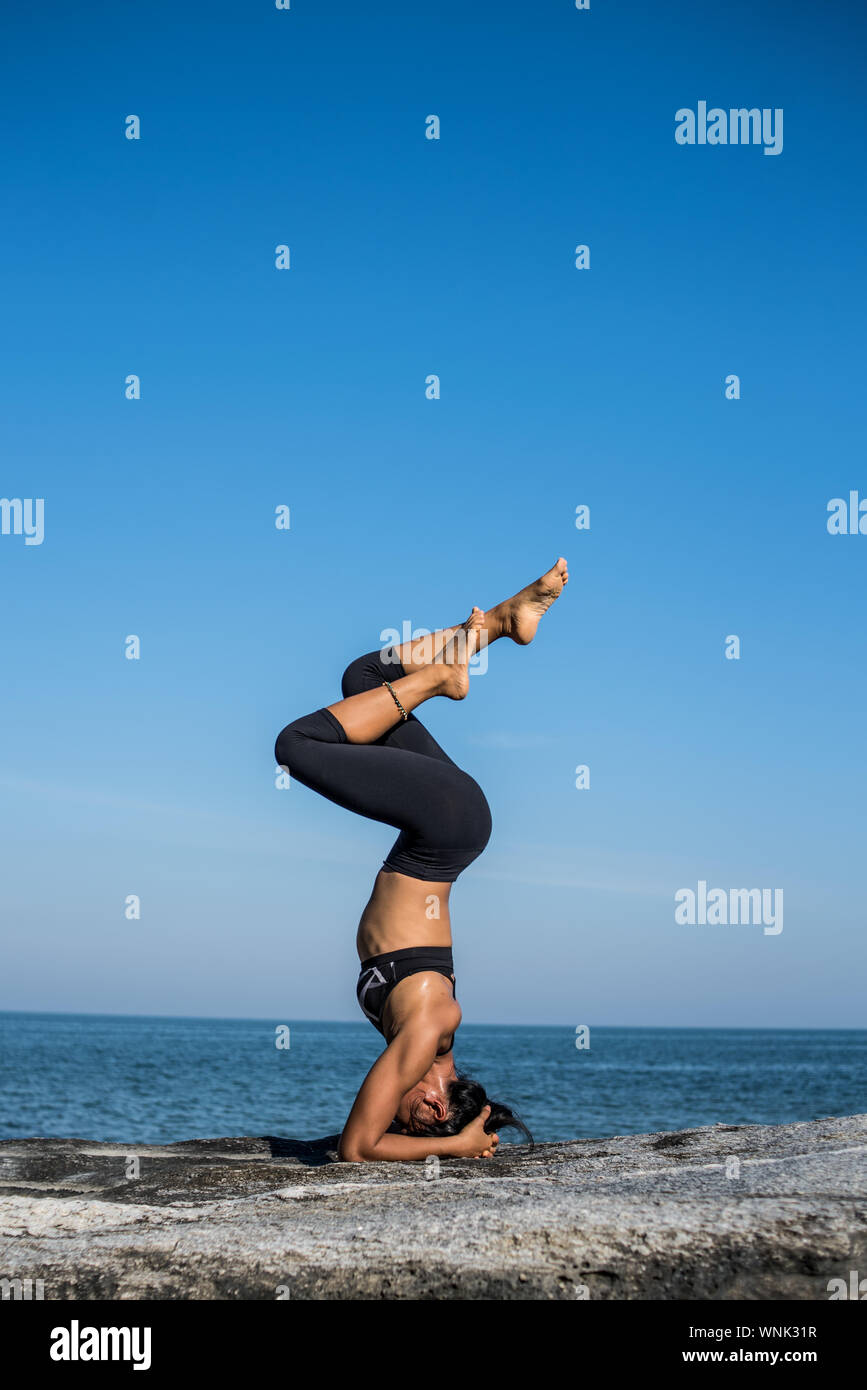 Woman Headstand Beach High Resolution Stock Photography and Images - Alamy
