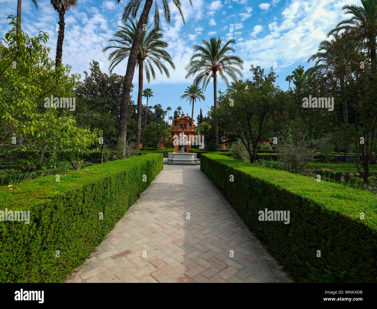 Symmetrical avenue The Real Alcazar Seville The Royal Alcazar's of ...