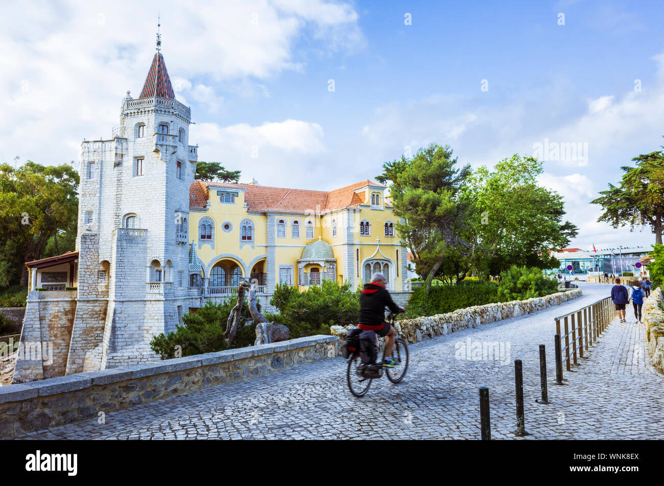 Cascais, Lisbon district, Portugal : A man cycles past the Condes de ...