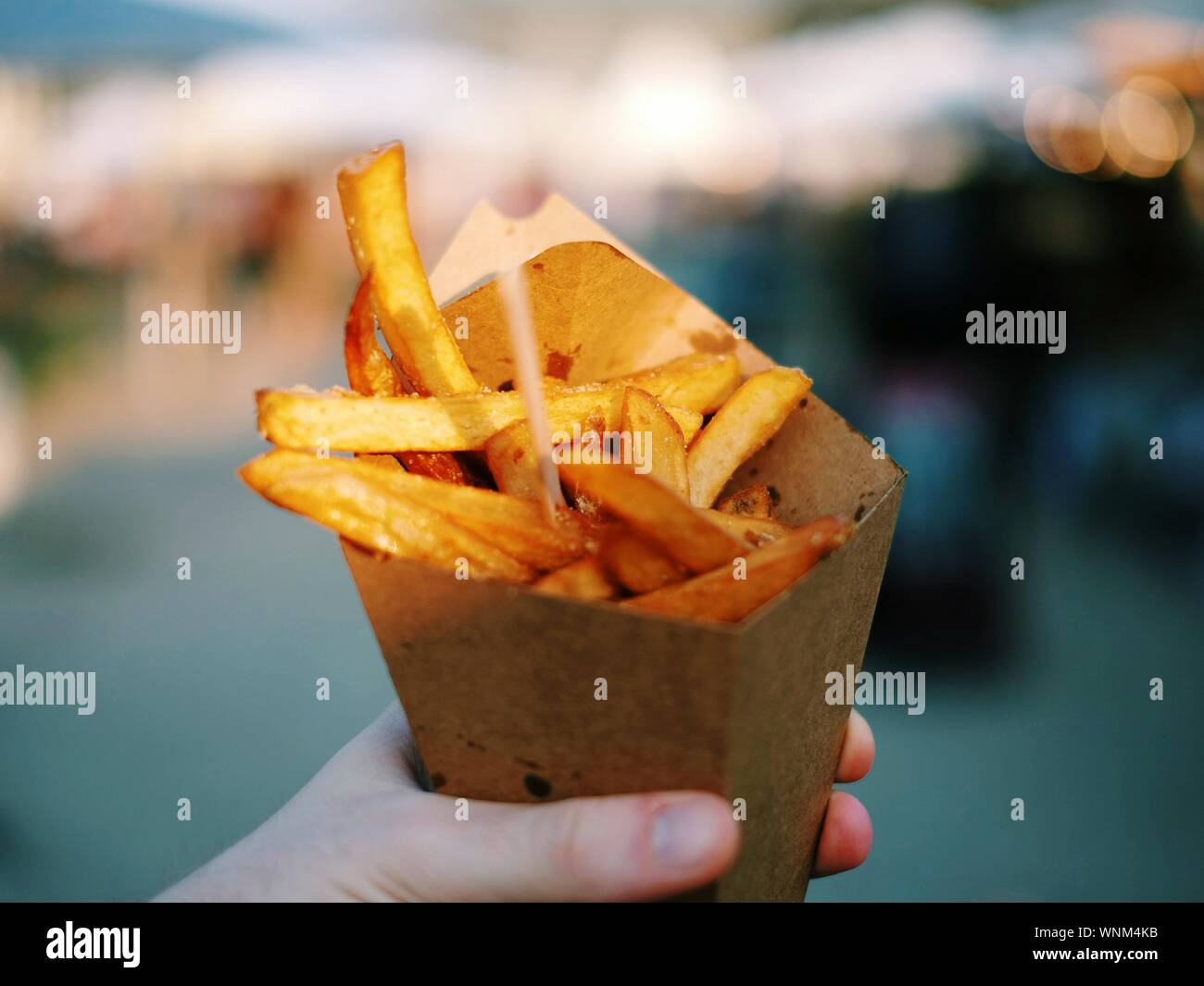 Hand and chips hi-res stock photography and images - Alamy