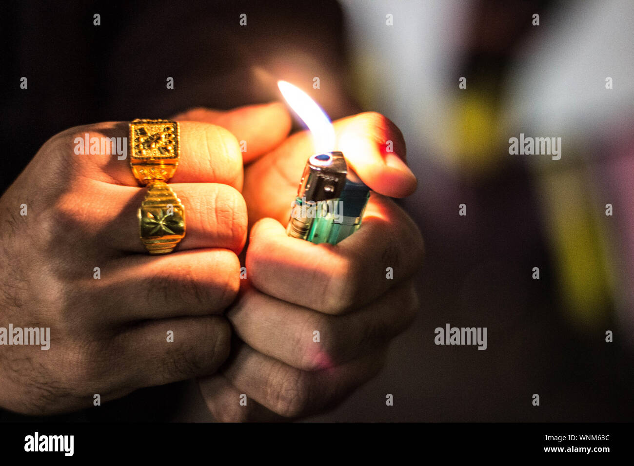 Man with lighter hi-res stock photography and images - Alamy