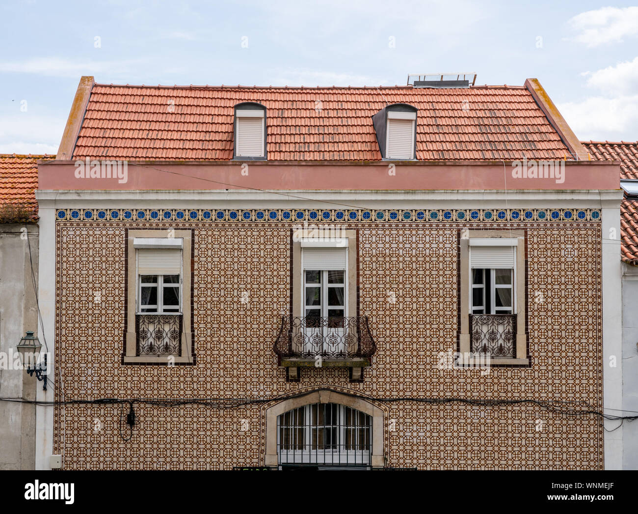 Traditional ceramic tiles decorate exterior of large house in Lisbon ...