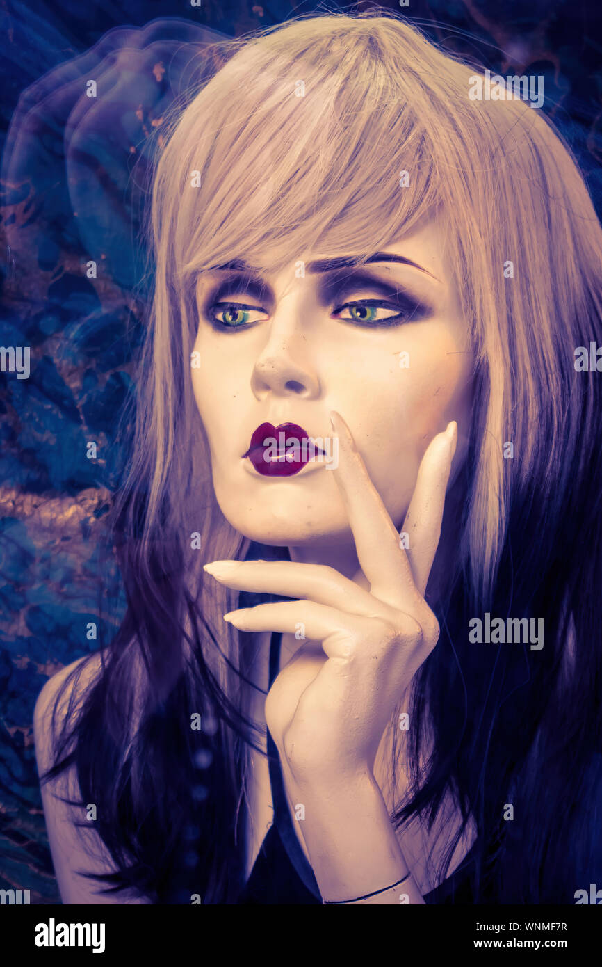 Cool and stylish looking female mannequin in a store window Stock Photo ...