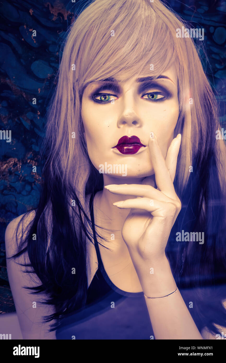 Cool and stylish looking female mannequin in a store window Stock Photo ...
