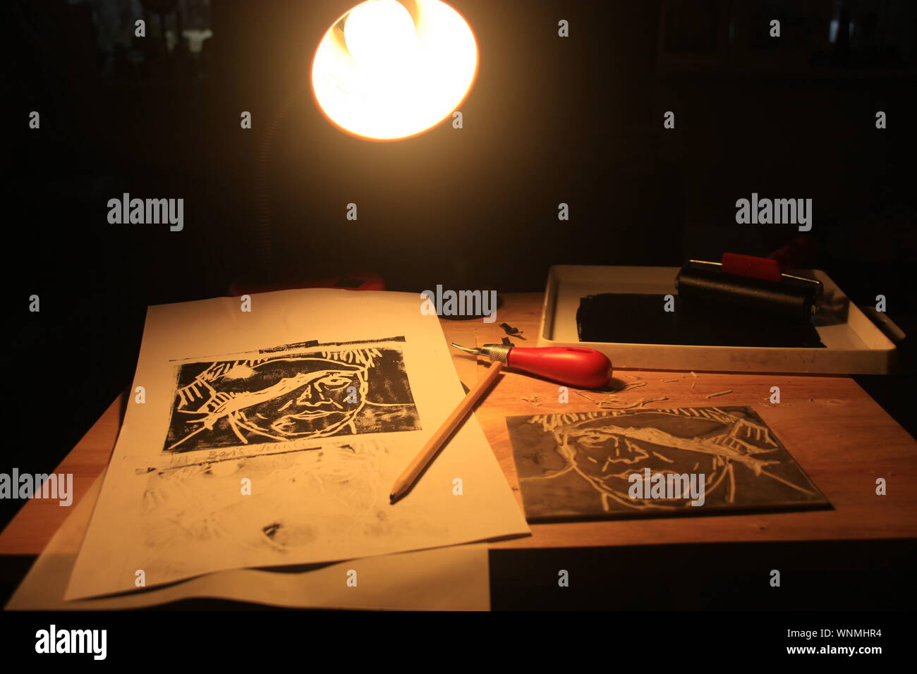 Close-up of fine art linocut of Prime Minister, Boris Johnson on an ...