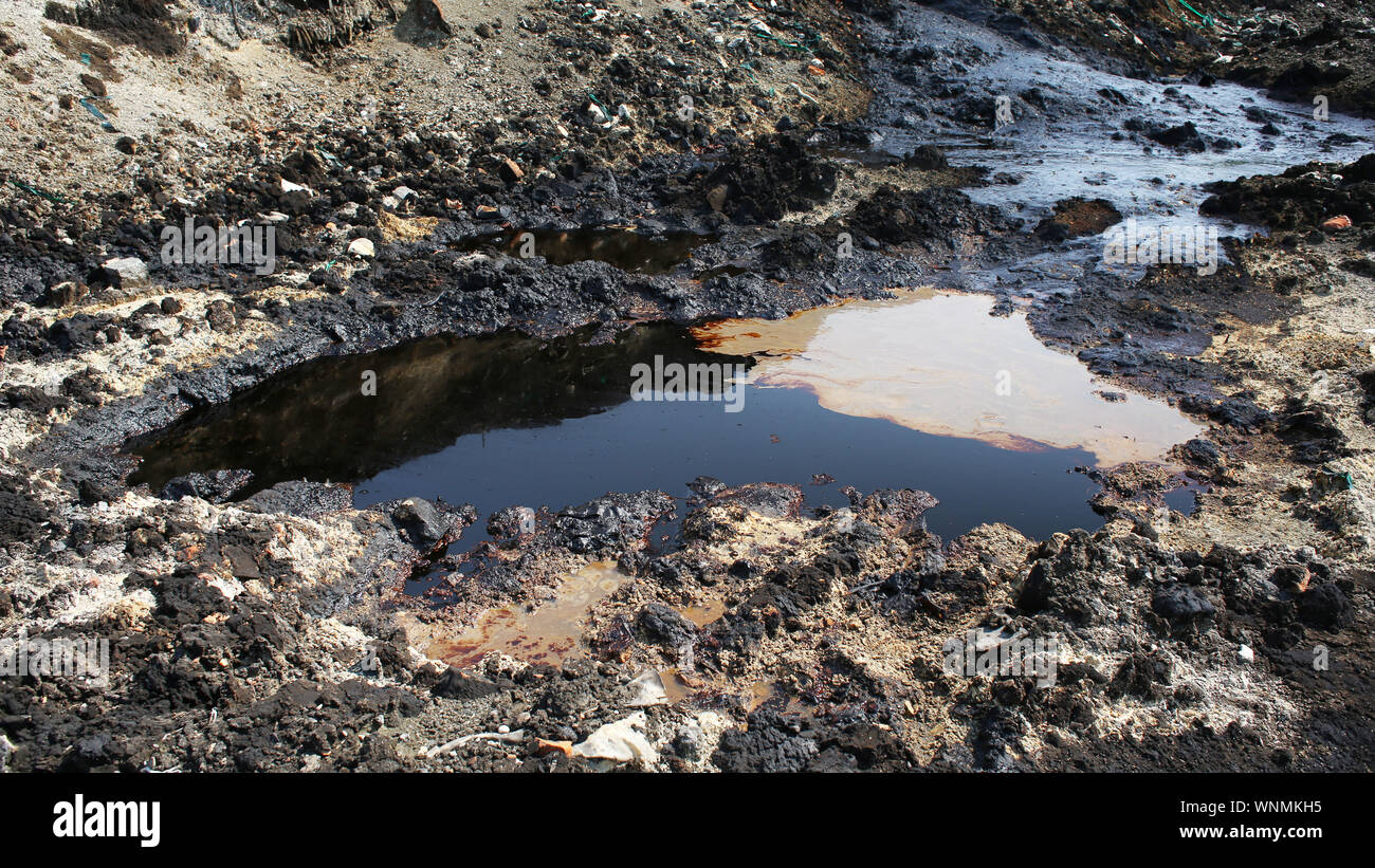 Contamination soil and water spot oil pollution, former dump toxic ...