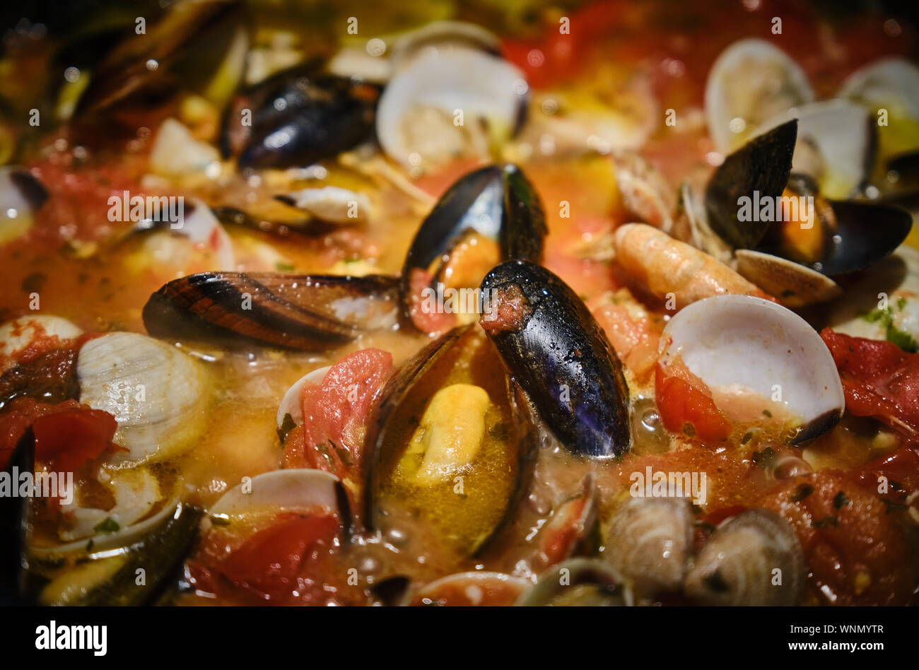 Close-Up Of Seafood Cooking In Pan Stock Photo - Alamy