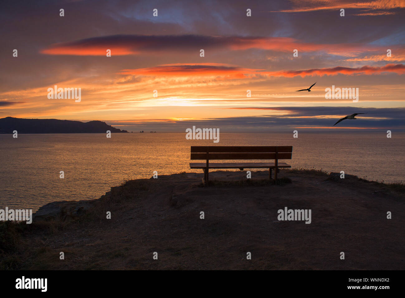 romantic bench with beautiful sunset views Stock Photo - Alamy