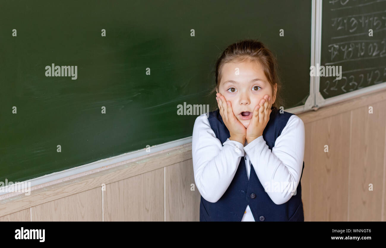 School uniform scared child hi-res stock photography and images - Alamy