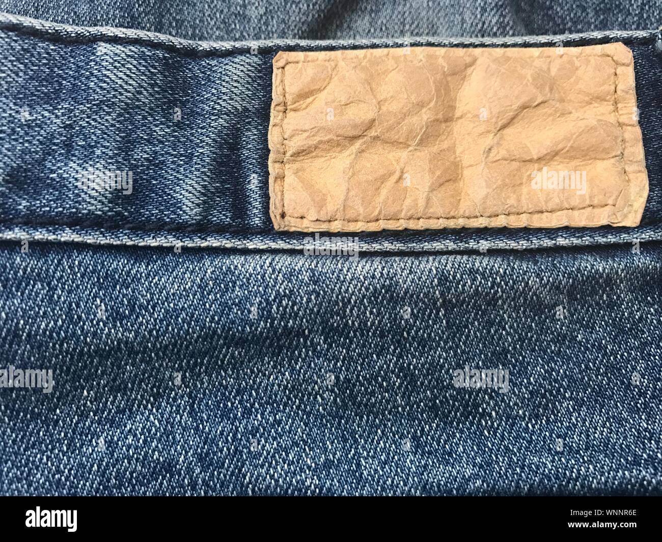 Crumpled blue jeans hi-res stock photography and images - Alamy