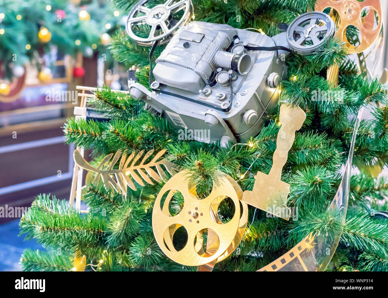Christmas tree decorated in the style of cinema Stock Photo - Alamy