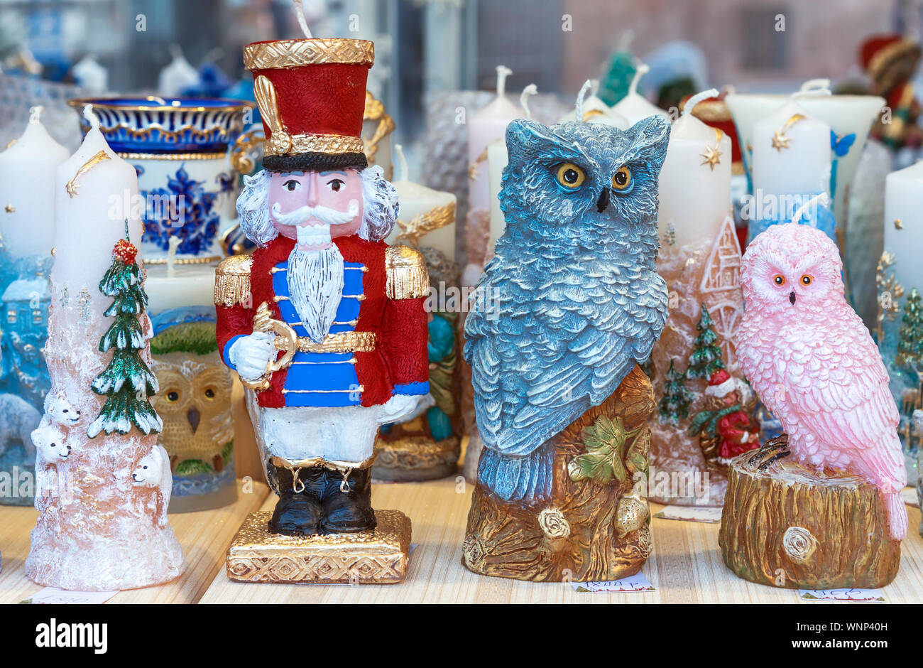 Candles in the form of figures of various fairy tale characters Stock ...