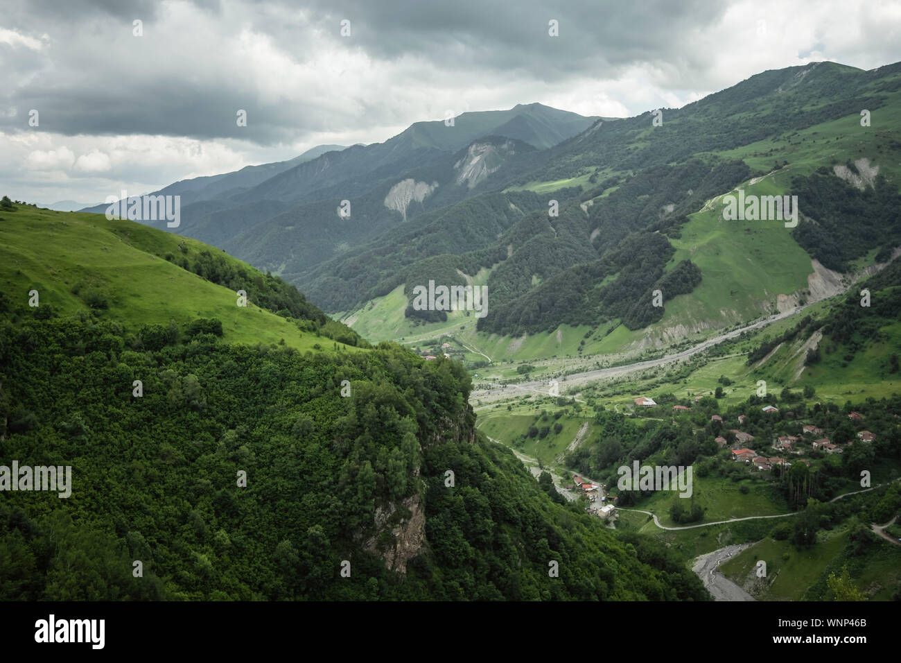 Caucasian Mountain ranges and valleys at Gudauri, Georgia. Summer day ...