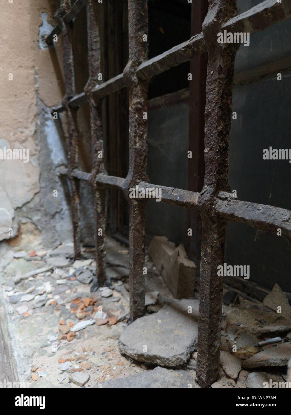 old window with broken glass and rusty grille Stock Photo - Alamy
