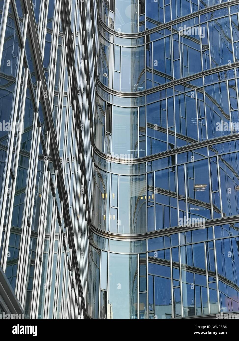 modern looking office building with glass walls Stock Photo - Alamy