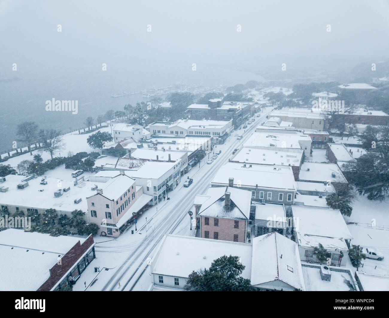 Aerial view of small town in snowstorm Stock Photo - Alamy