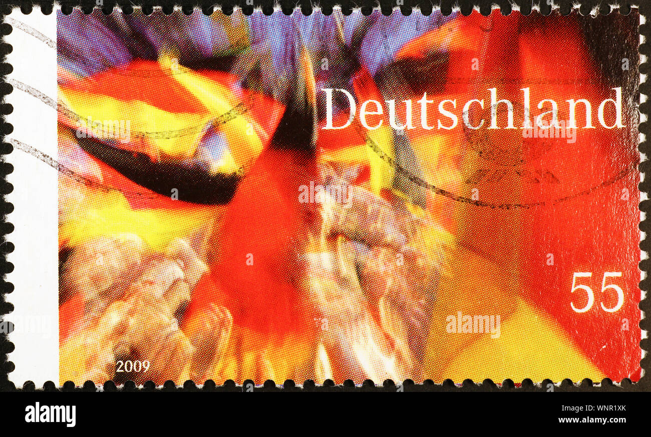 Waving German flags on postage stamp Stock Photo - Alamy