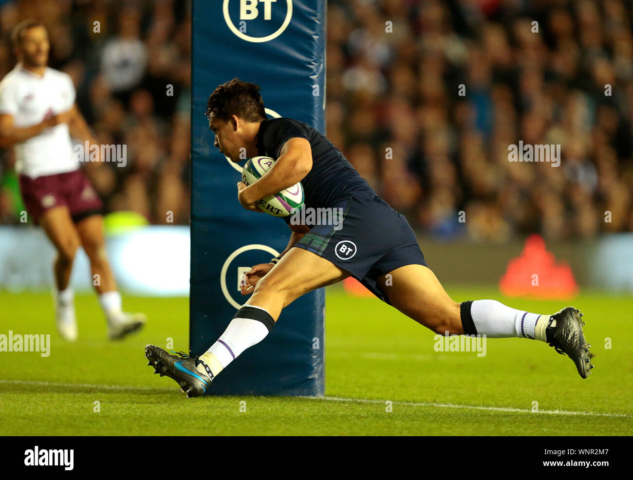 Scotland's Sam Johnson scores their third try against Georgia during ...