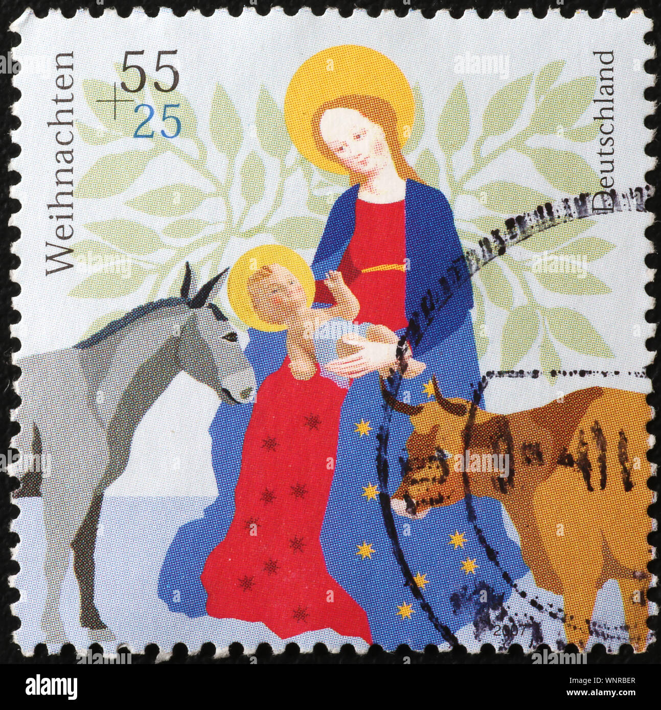Mary and Jesus child on german postage stamp Stock Photo - Alamy